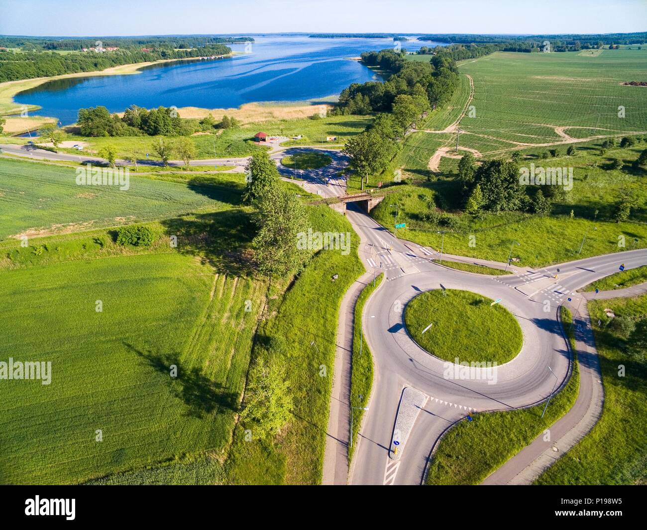 Aerial view of roundabout circles, railroad line and bike lanes, Mazury ...