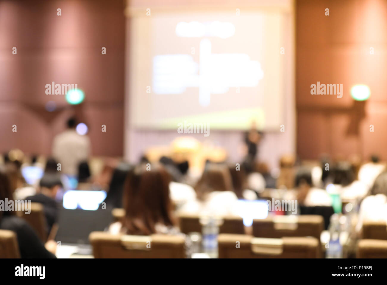 Abstract blurry background of employees seminar and De-focus teamwork ...