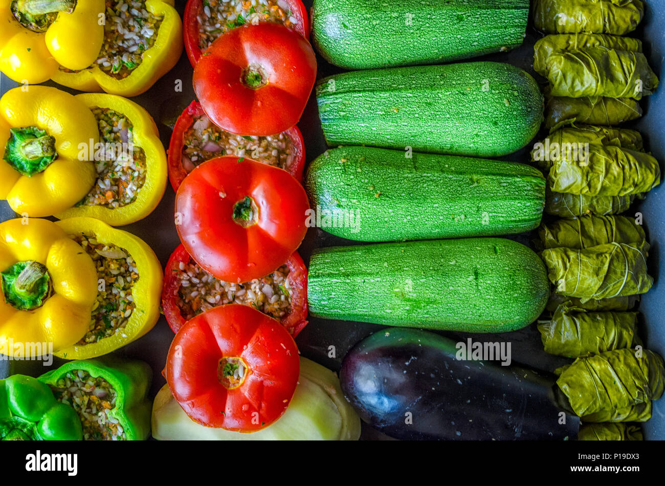 Greek traditional food Gemista ready to be cooked in the oven. Stuffed ...