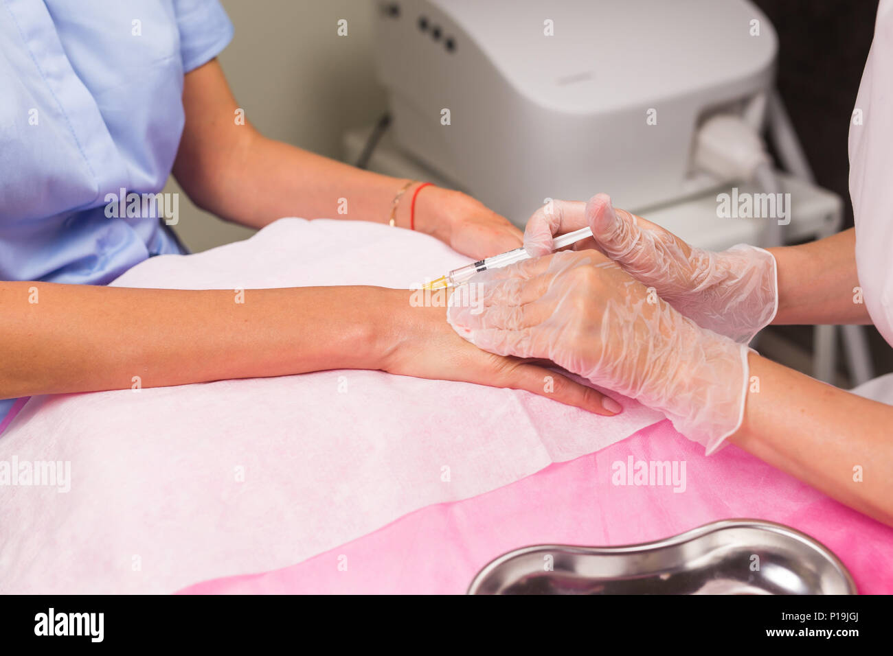 cosmetology and beauty concept - Anti-age injection therapy, hand ...