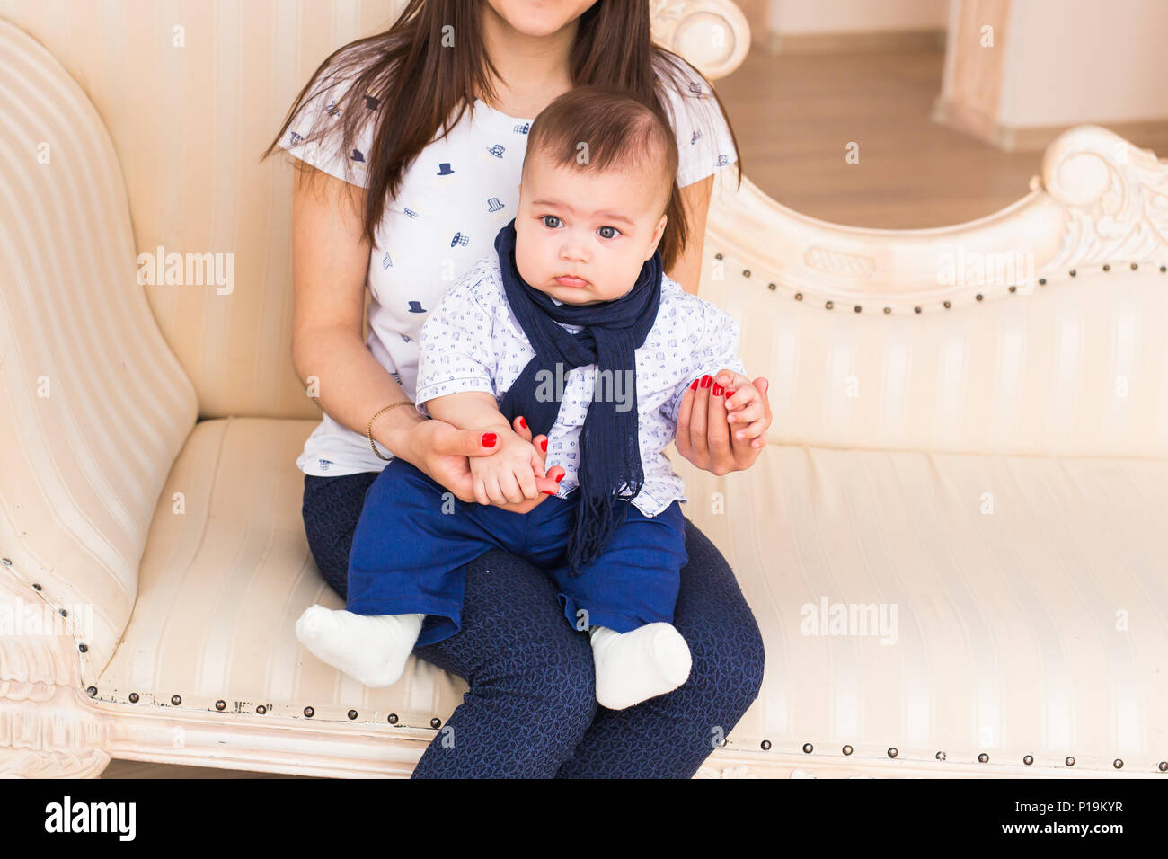 Portrait of happy mother and baby indoors Stock Photo - Alamy