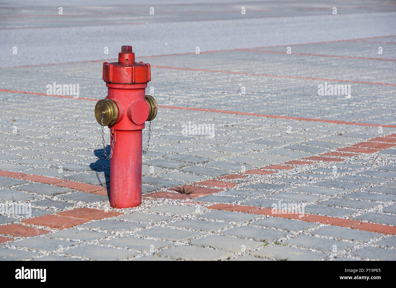 Old red fire hydrant in the street. Fire hidrant for emergency fire ...
