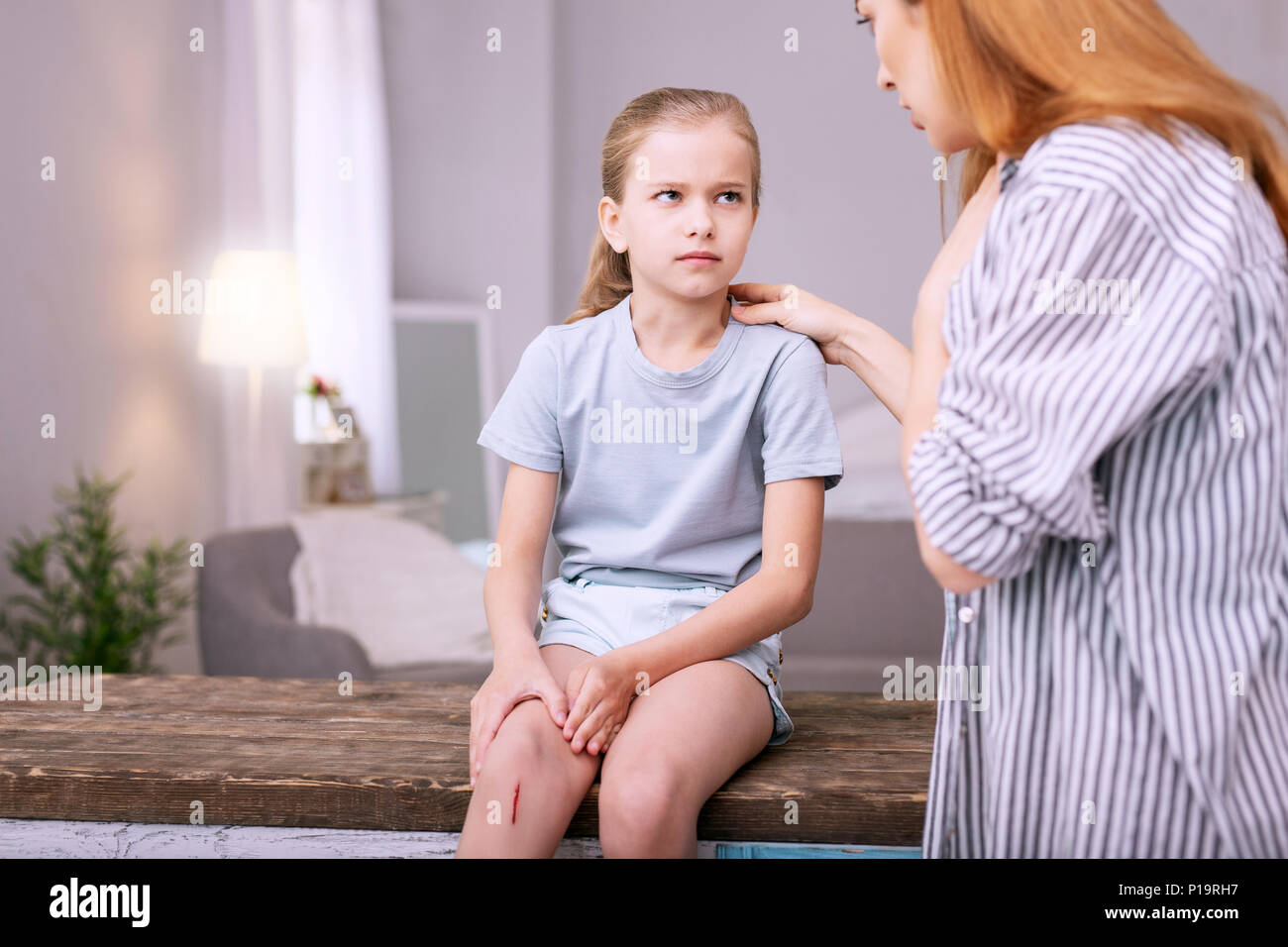 Sad unhappy girl having an injury Stock Photo - Alamy