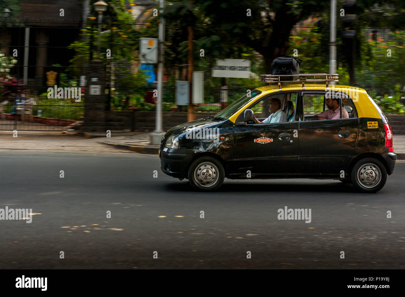 MUMBAI, INDIA - DECEMBER 4, 2016 : Traditional indian black and yellow ...
