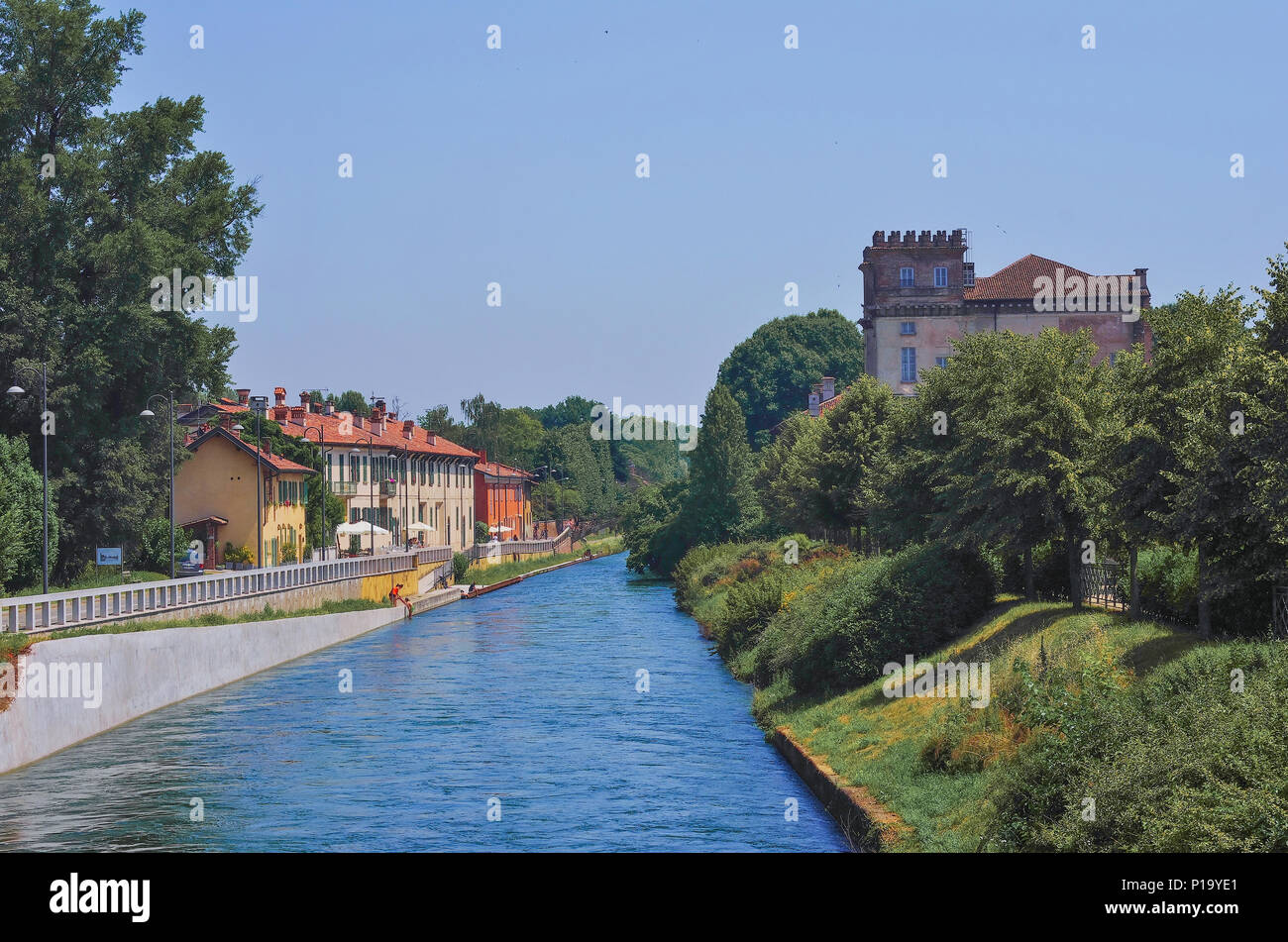 the Naviglio Grande flows through the Lombardy countryside between ...