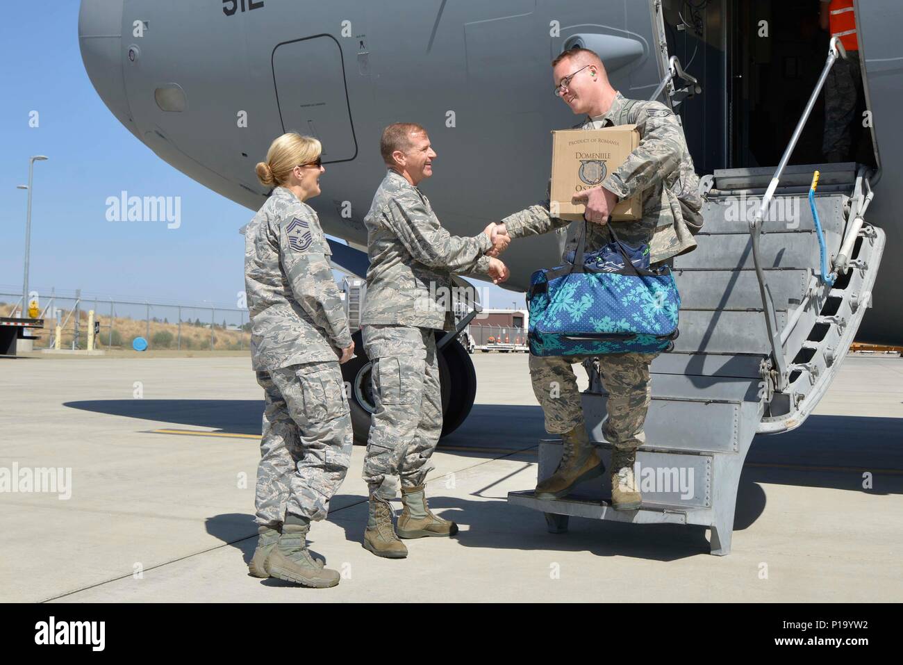 U.S. Air Force Staff Sgt. Andrew Cochran (right), 144th Maintenance ...