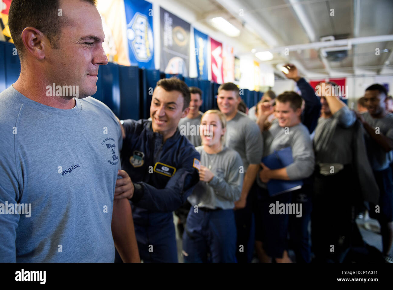 Cadets line up to punch the newly sewed on stripes of Master Sergeant ...