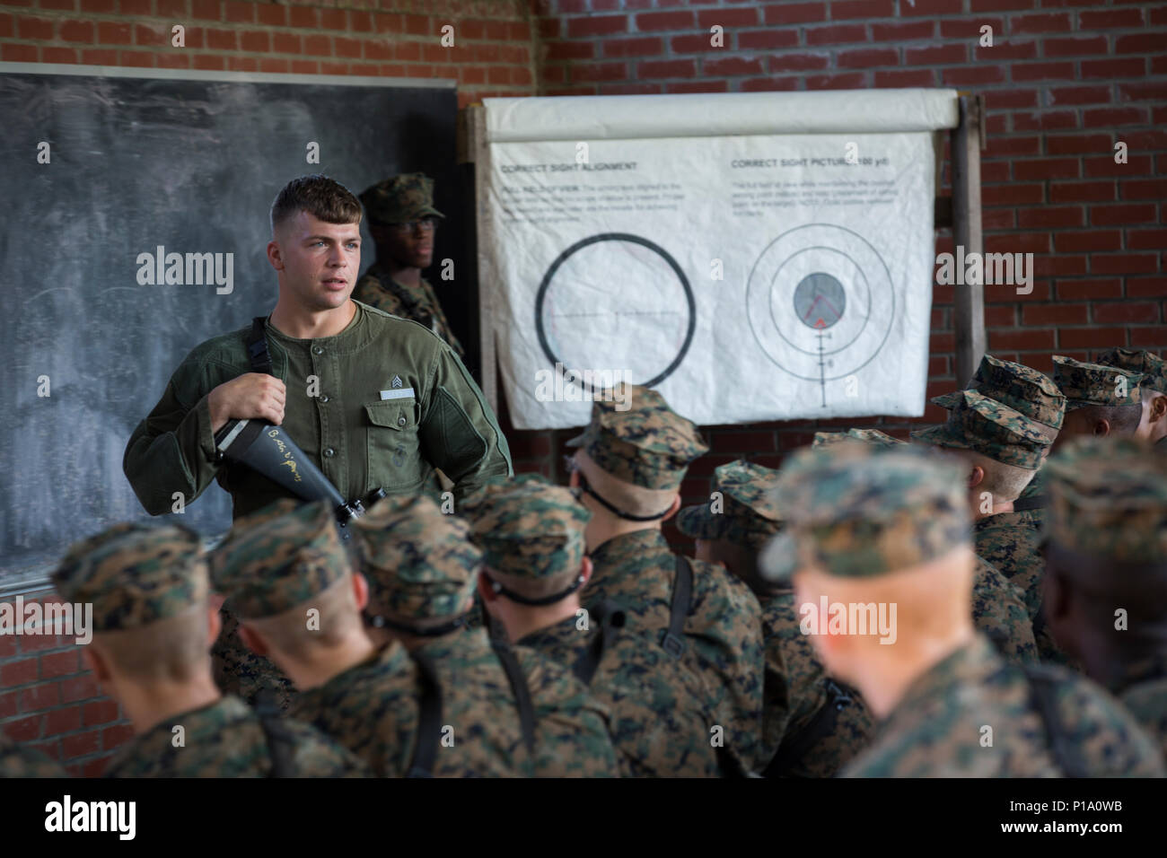 U.S. Marine Corps Sgt. Cory Leister, primary marksmanship instructor ...