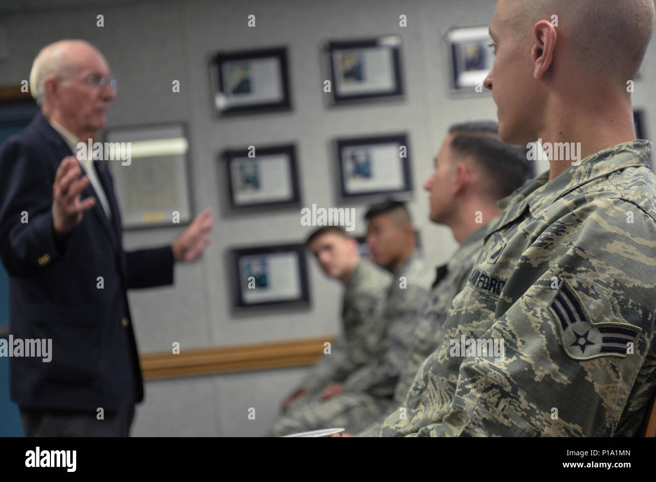 Students in Airman Leadership School class 2016-G listen to the eighth ...