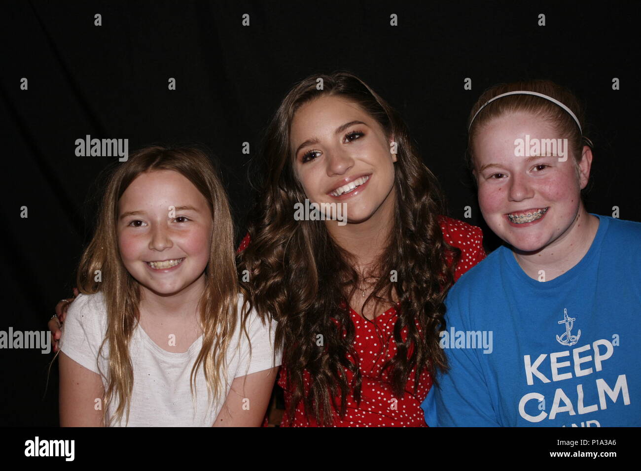 Mackenzie Ziegler poses with fans during the release of her new book ...