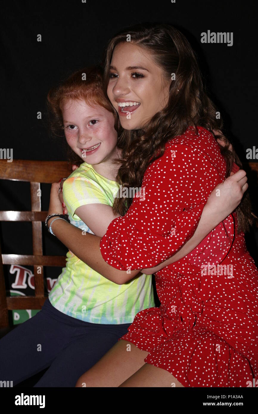Mackenzie Ziegler poses with fans during the release of her new book ...