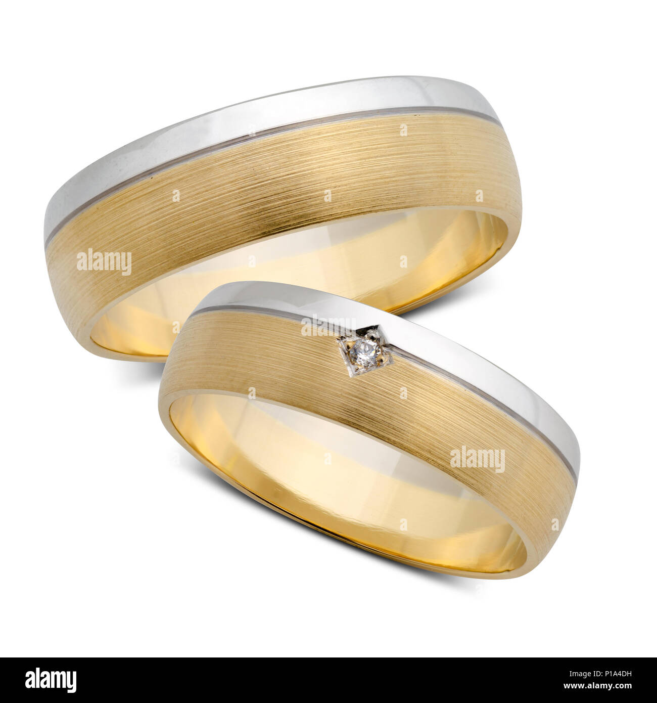 A pair of wedding rings, isolated on white background Stock Photo - Alamy
