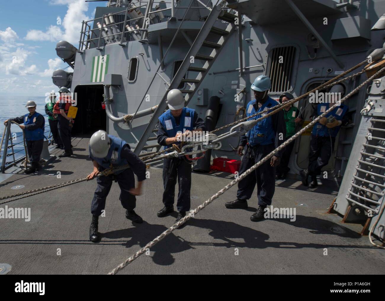 161002-N-SU278-148 SOUTH CHINA SEA (Oct. 2, 2016) Sailors assigned to ...
