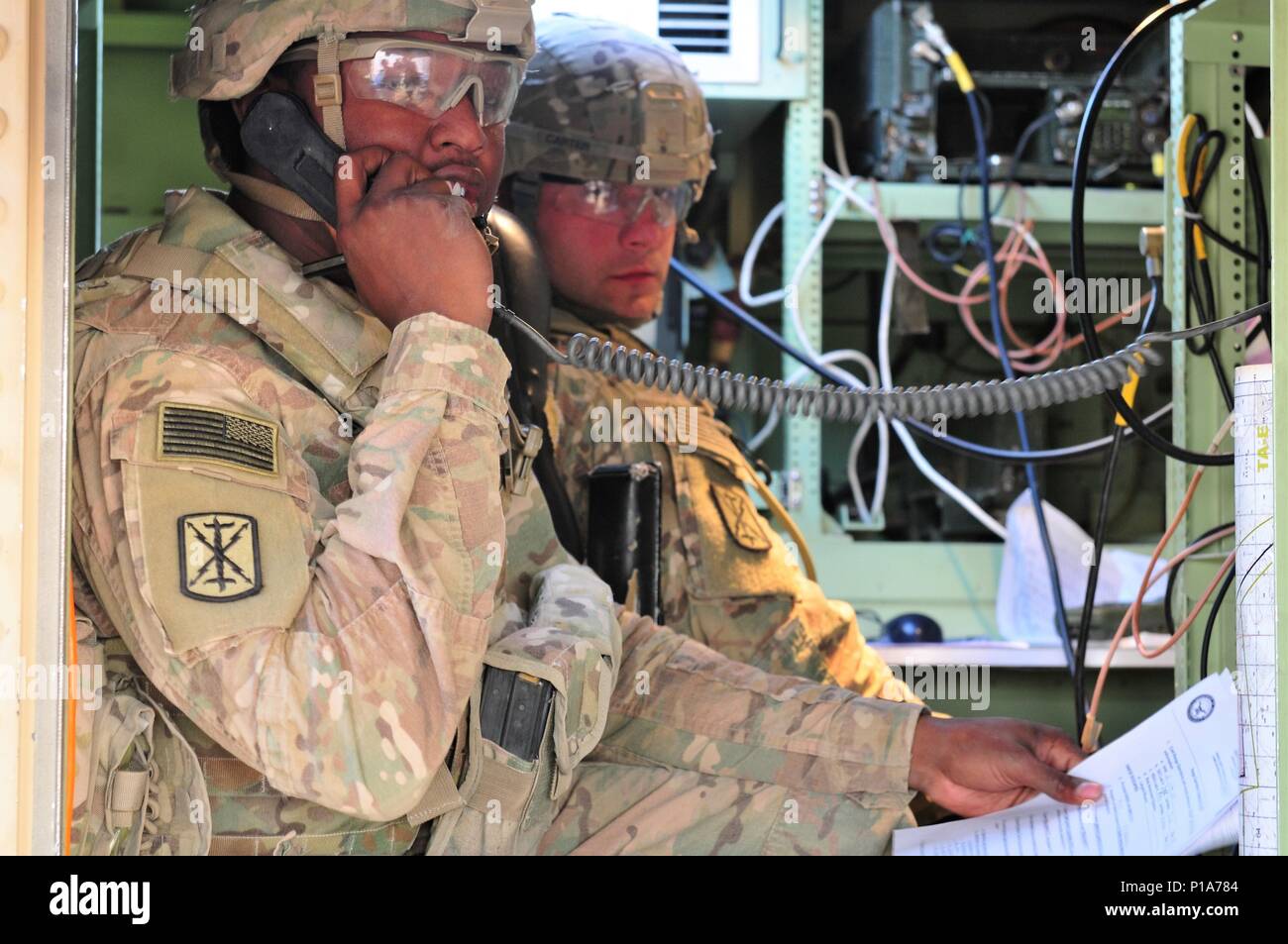 Soldiers of Alpha Company, 1st Battalion, 94th Field Artillery Regiment ...