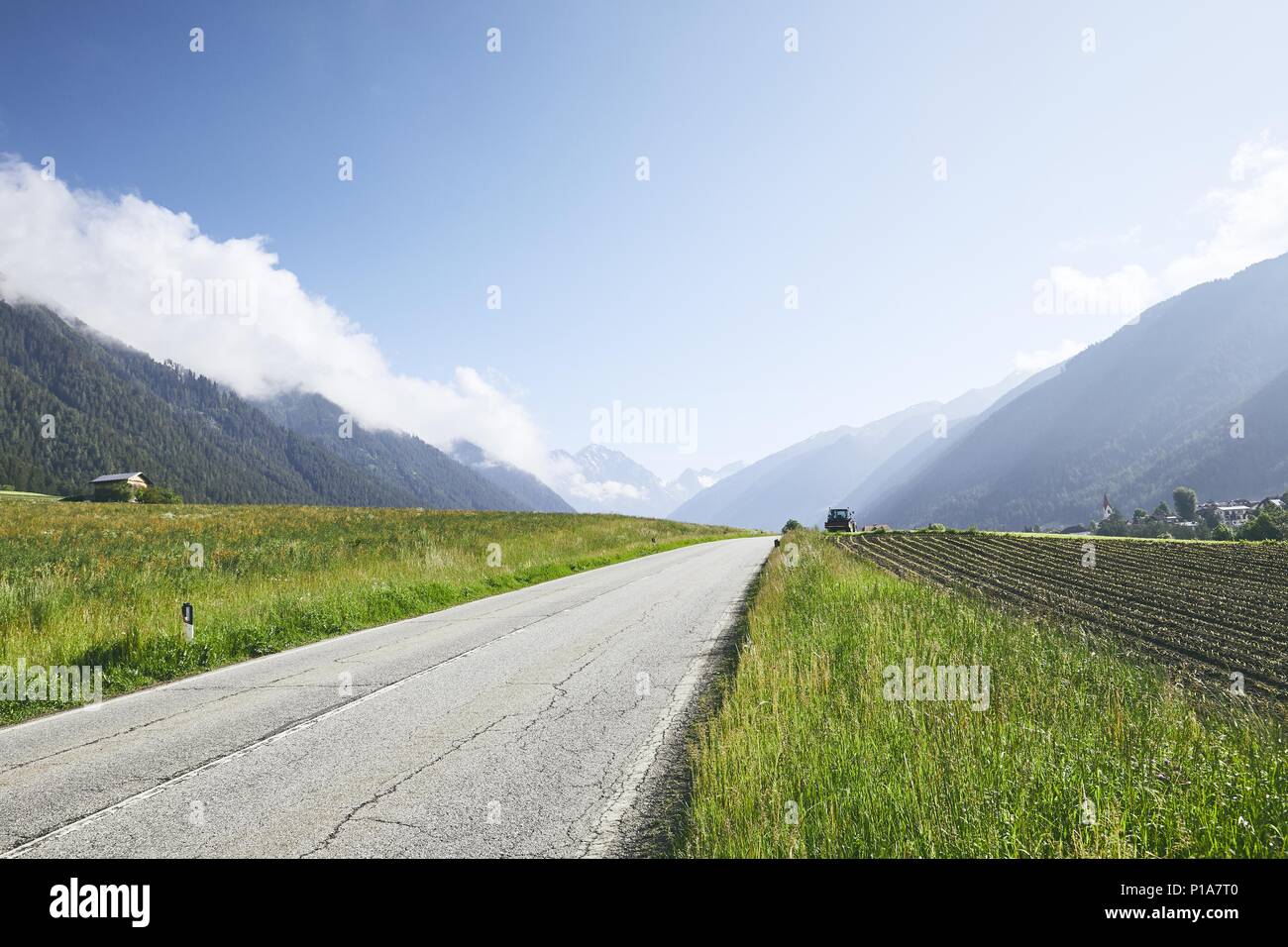 Empty road into mountains hi-res stock photography and images - Alamy