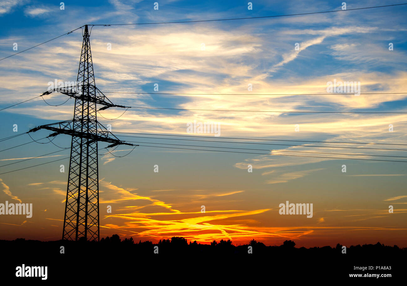 Sehnde, Germany, sunset behind high voltage line Stock Photo - Alamy