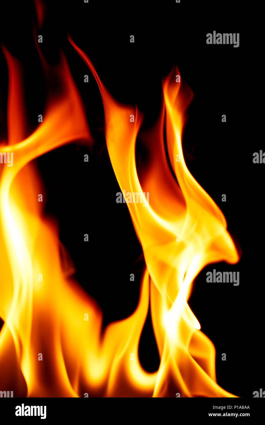 Real red flames in black space Stock Photo - Alamy