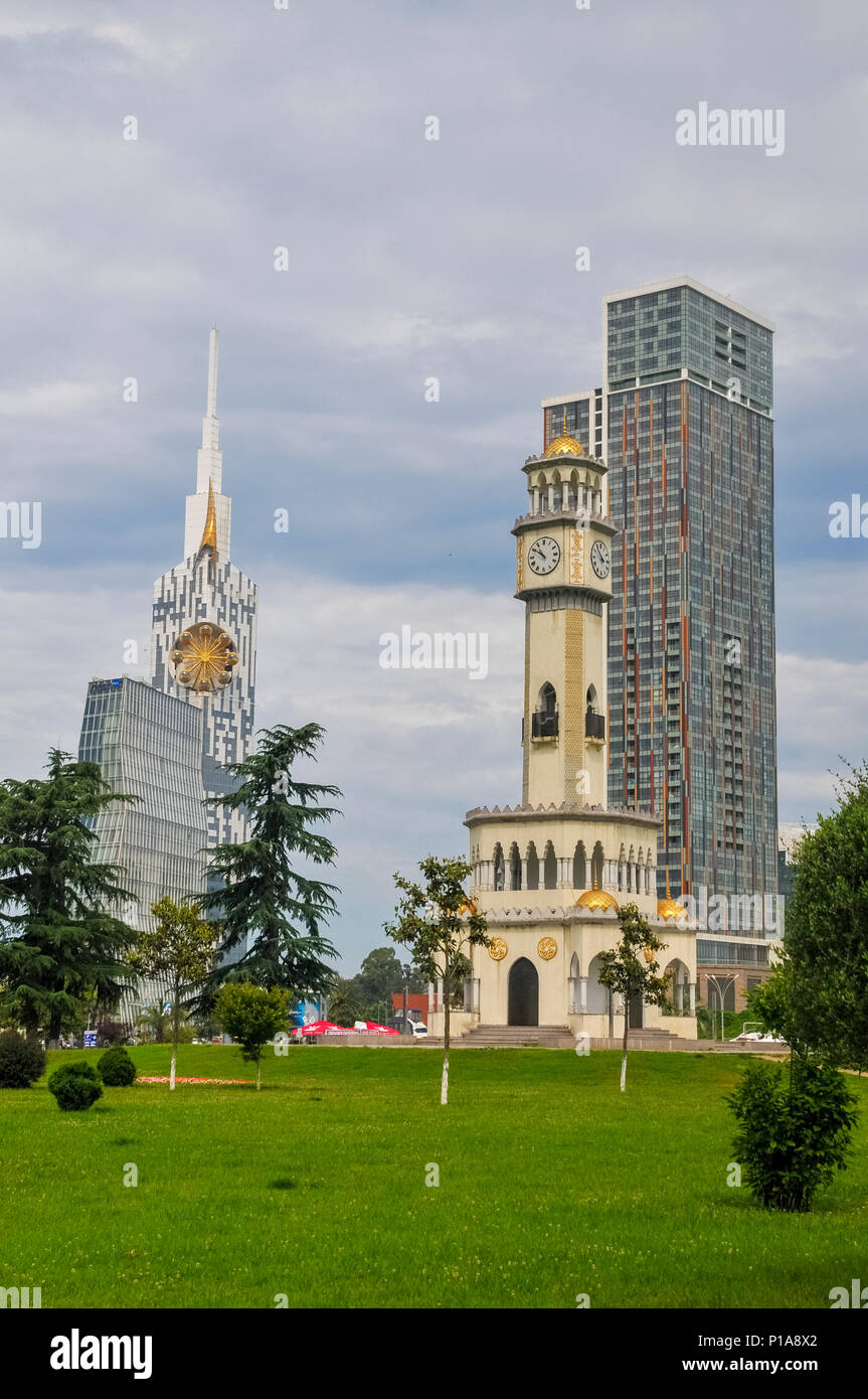 Old Clock Tower and Technological University tower in Miracle Park, on ...