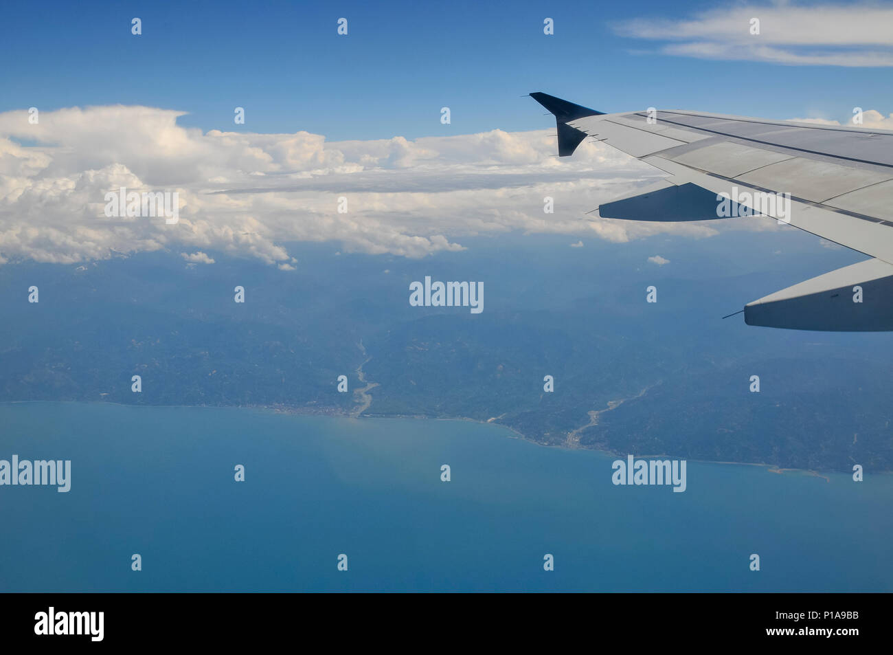 Elevated view of the Mediterranean Sea and clouds as seen through the ...
