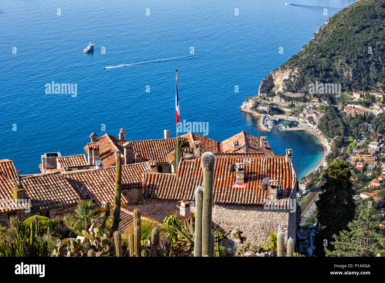 Medieval Eze village houses on mountain top at Mediterranean Sea in ...