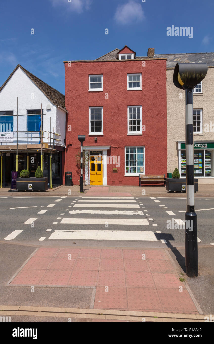An attractive house on Market street Tetbury, viewed acoss a zebra ...