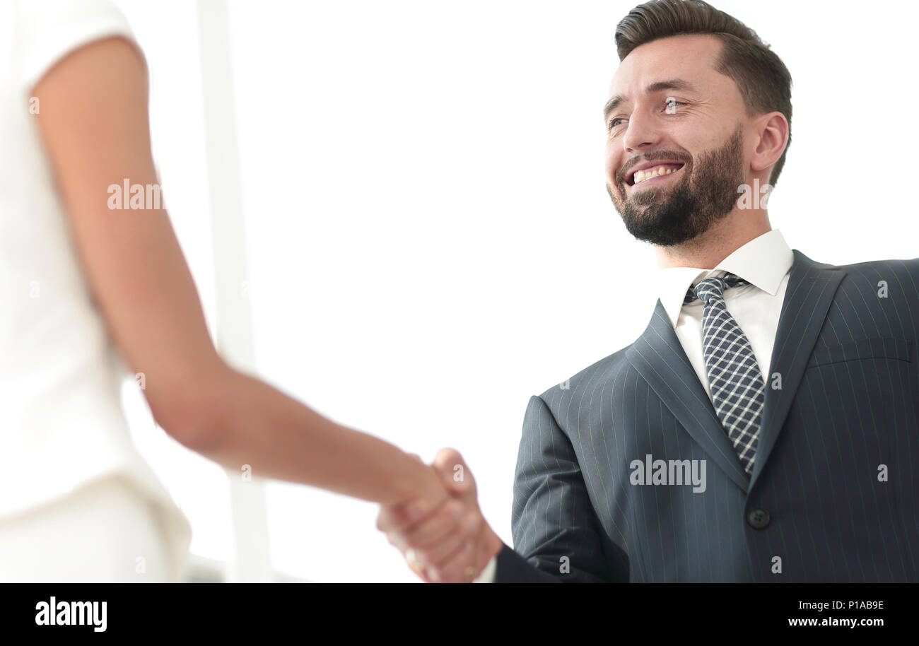 Image of business partners handshaking in office Stock Photo - Alamy