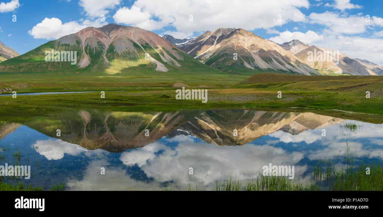 Mountains reflecting in water, Naryn gorge, Naryn Region, Kyrgyzstan ...