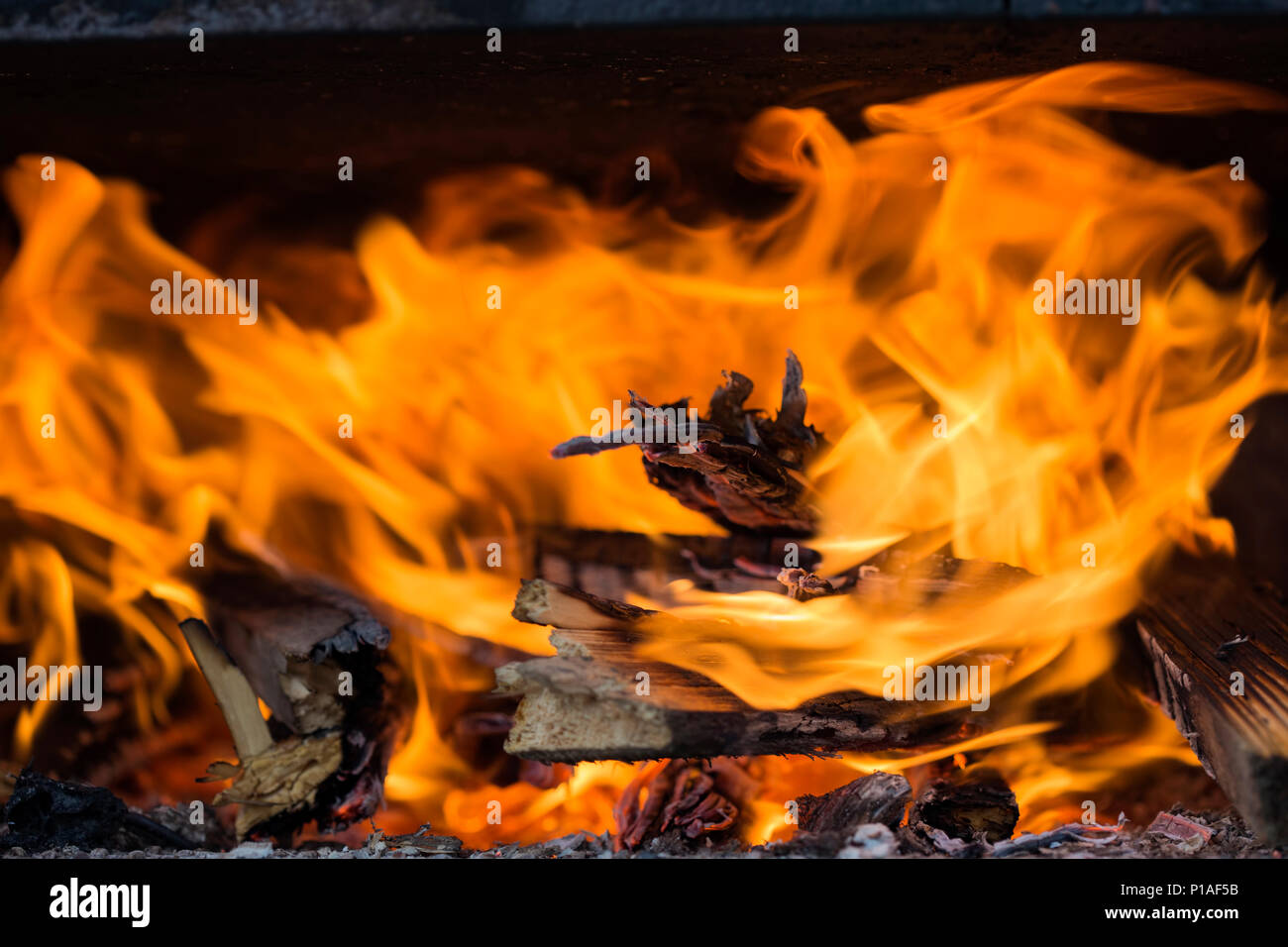 Close up of grill construction, with yellow and red fire flames Stock ...
