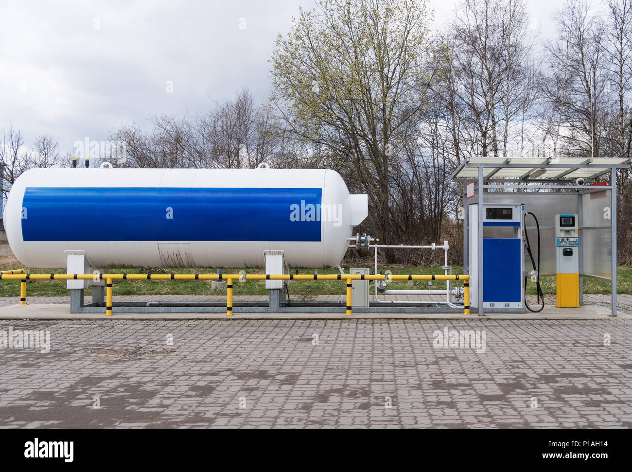LPG gas station with white tank Stock Photo - Alamy