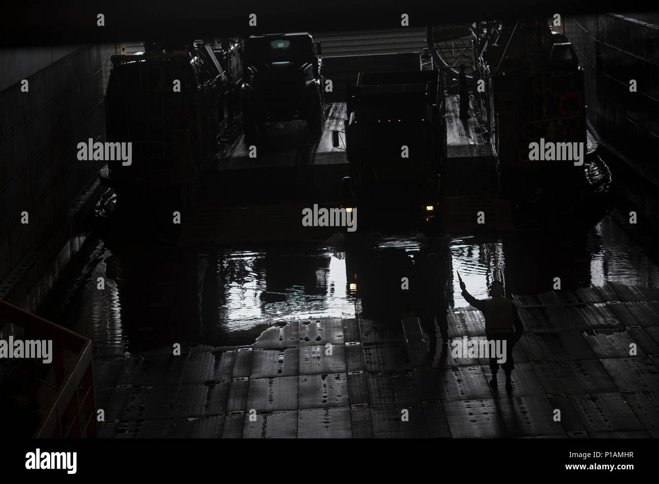 A cargo truck delivers food, first aid, and medical supplies to the ...