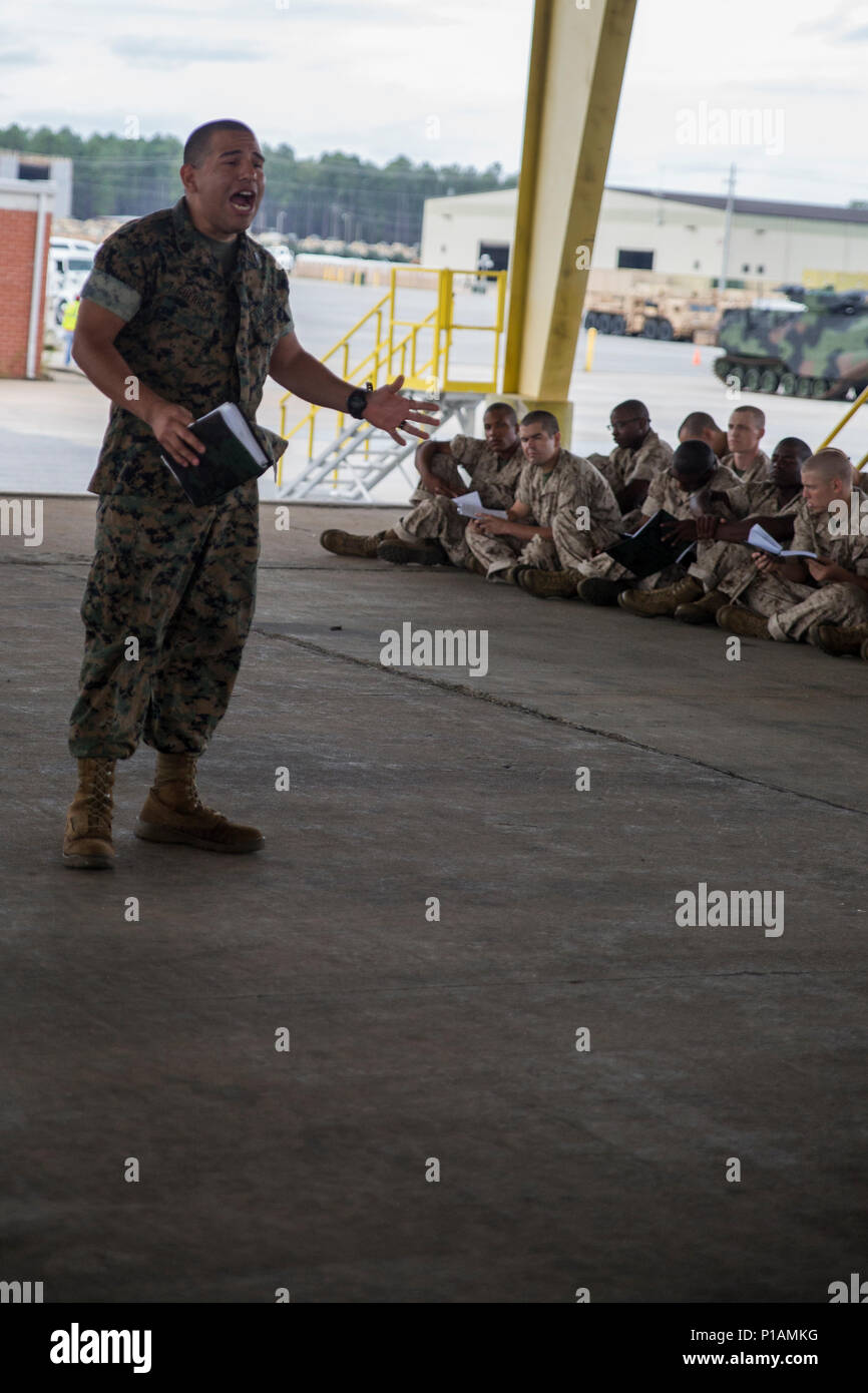 Staff Sgt. Pedro Guerrero, an academic instructor, teaches recruits of ...