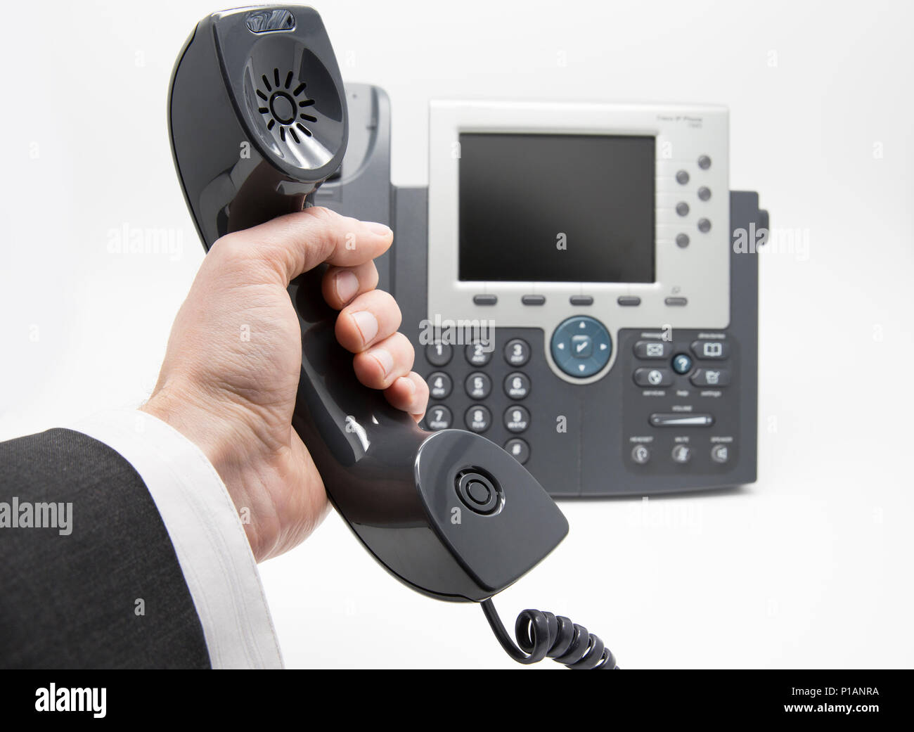 Hand picking up telephone hi-res stock photography and images - Alamy
