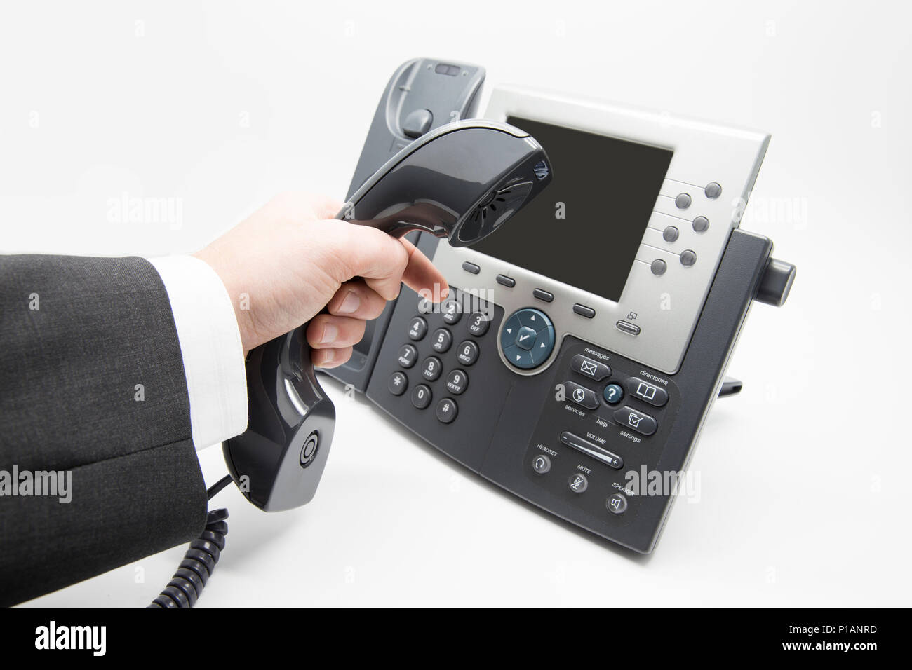 Making a call, Businessman is dialing IP telephone keypad Stock Photo ...