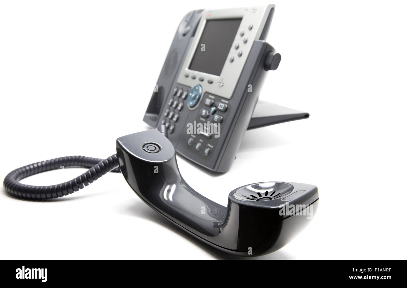 IP Phone with the receiever on the front, white isolated background ...
