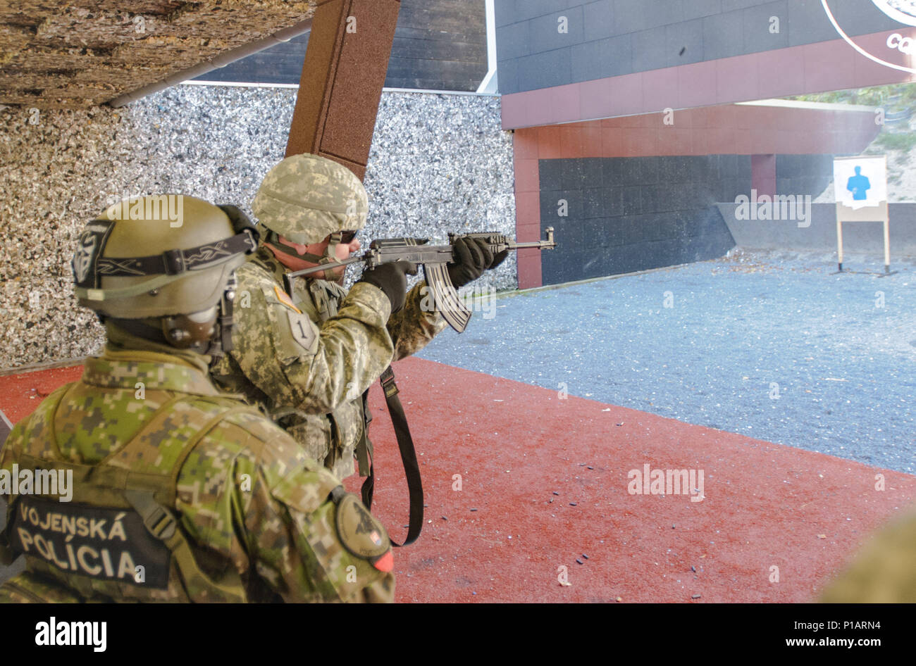 An Indiana National Guard Military Police Soldier practices shooting ...