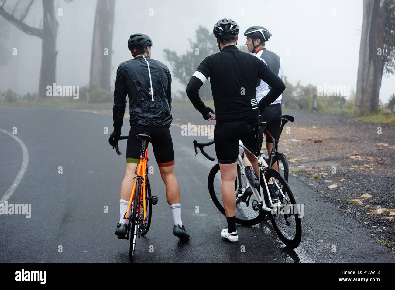 Man resting on bicycle hi-res stock photography and images - Alamy