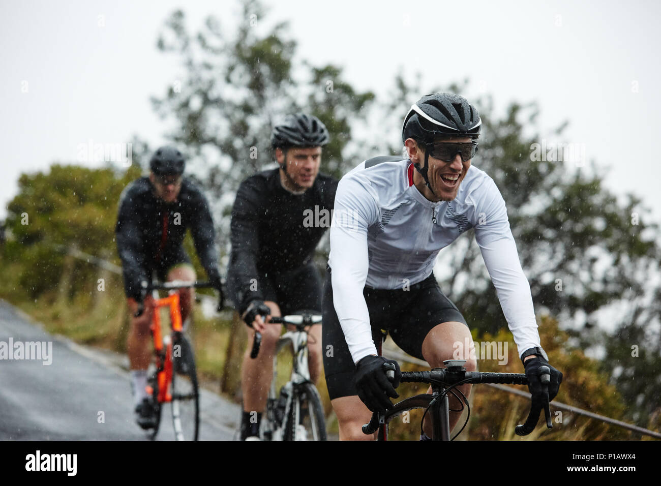Three friends cycling hi-res stock photography and images - Alamy