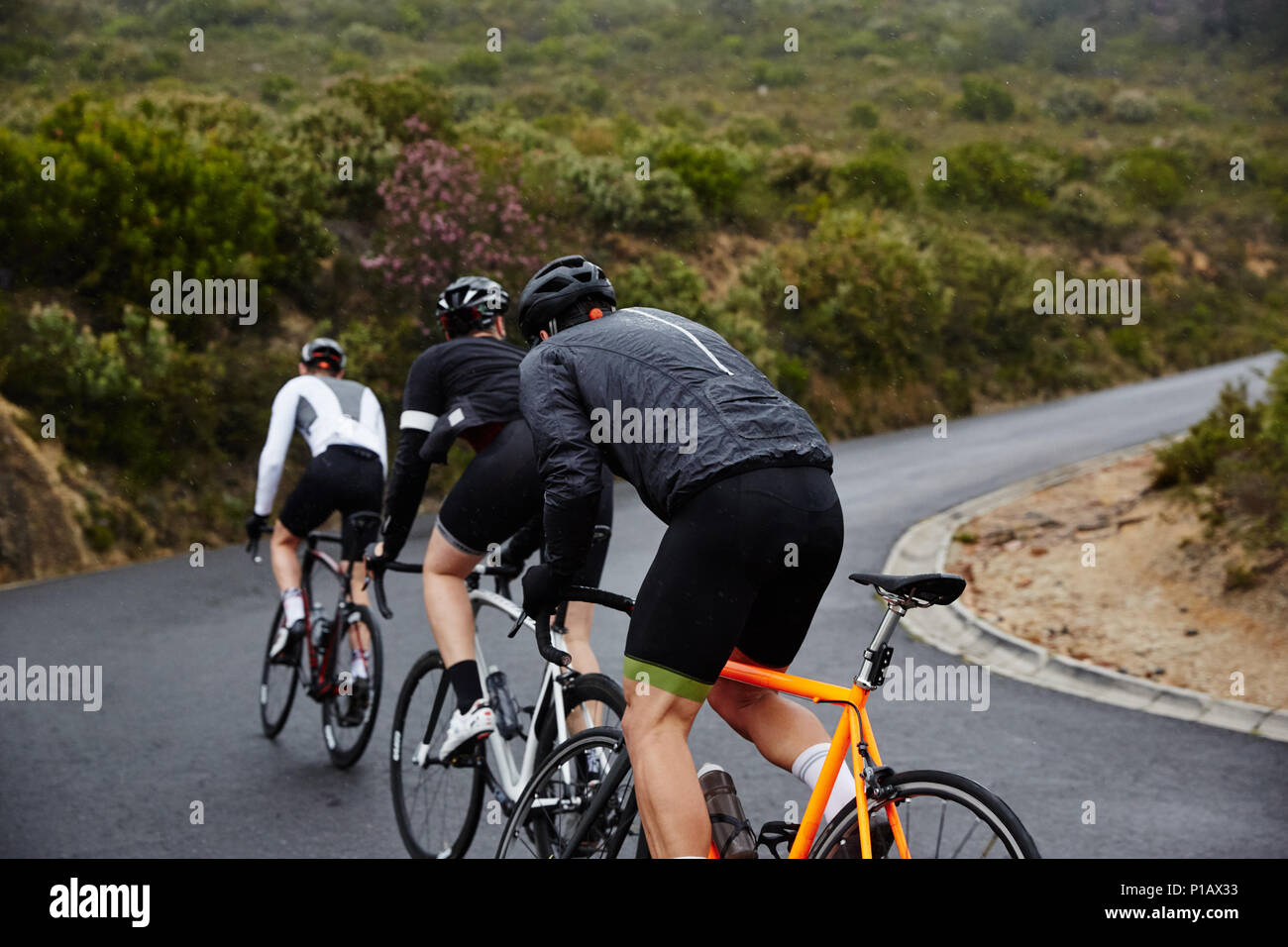 Man riding bicycle uphill on hi-res stock photography and images - Alamy