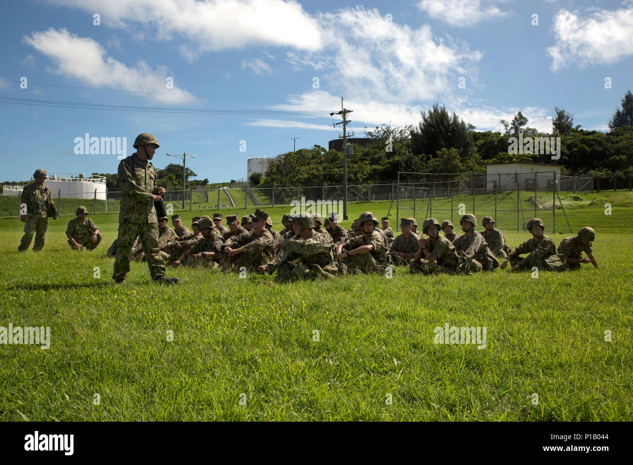 Japan Ground Self-Defense Force Sgt. Imato translates instructions ...
