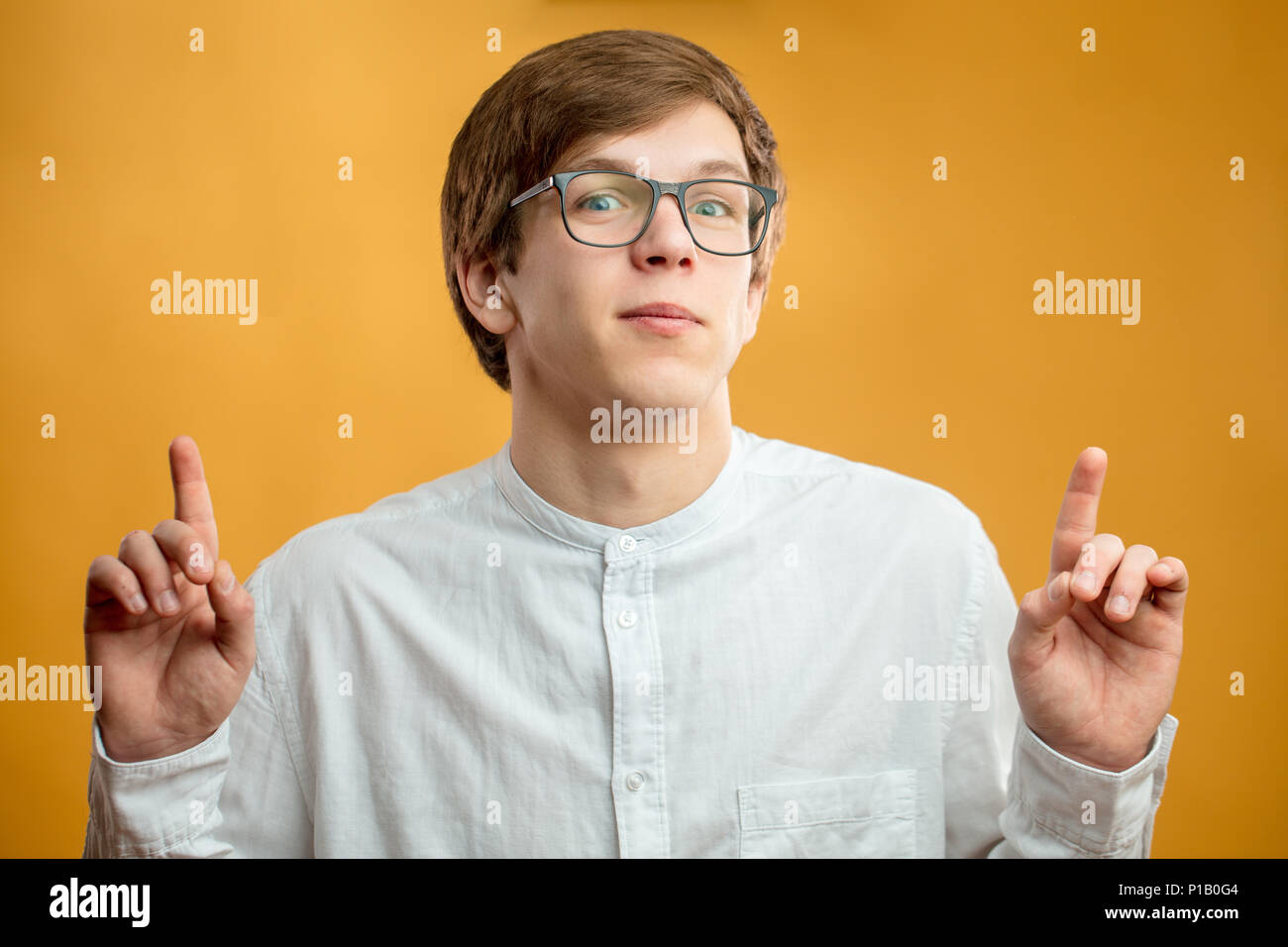 Businessman man raised index finger hi-res stock photography and images ...