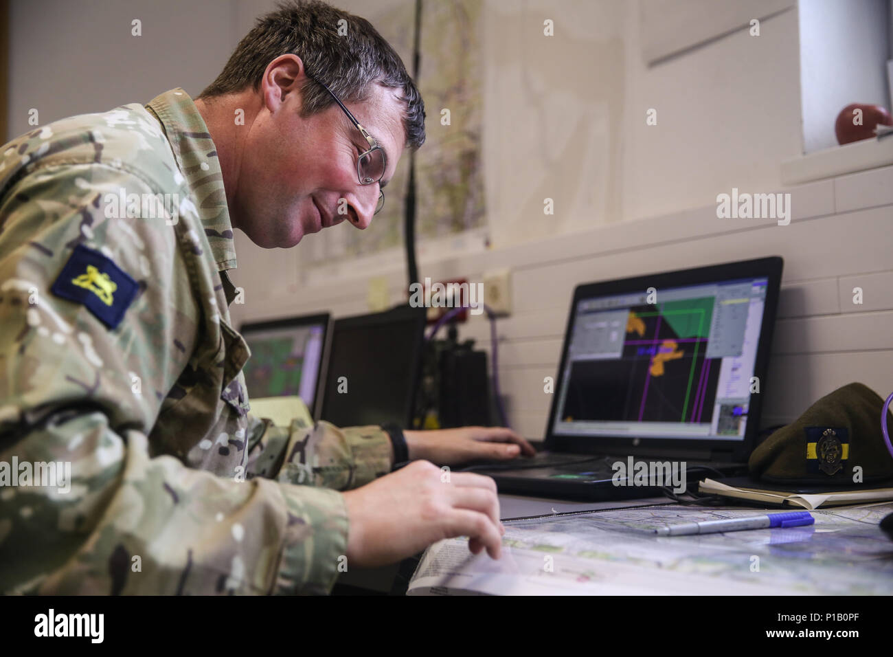A British soldier of Princess of Wales Royal Regiment transfers unit ...