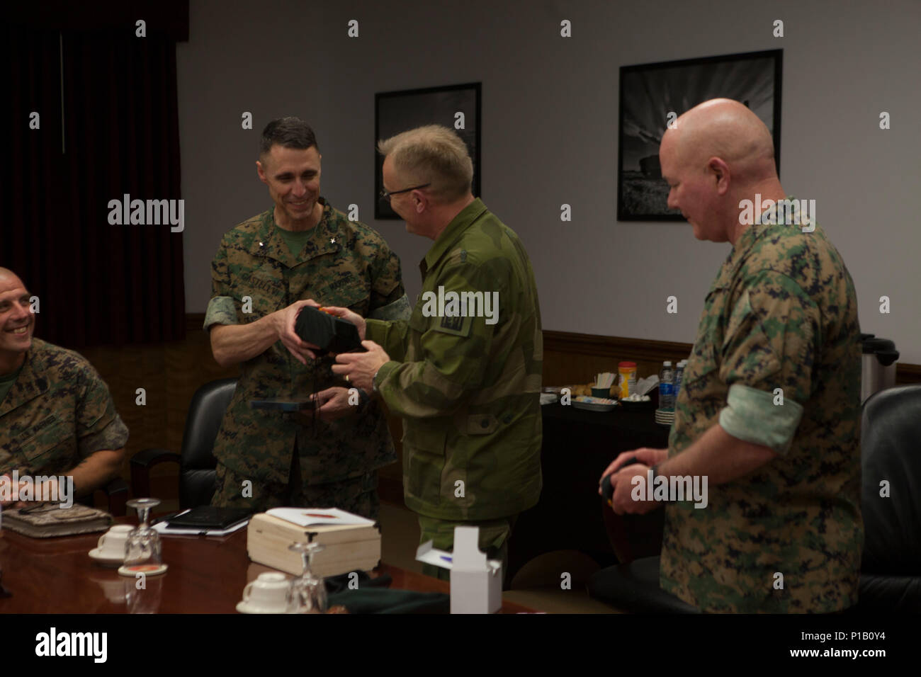 U.S. Marine Corps Brig. Gen. Robert Castellvi, left, deputy commanding ...