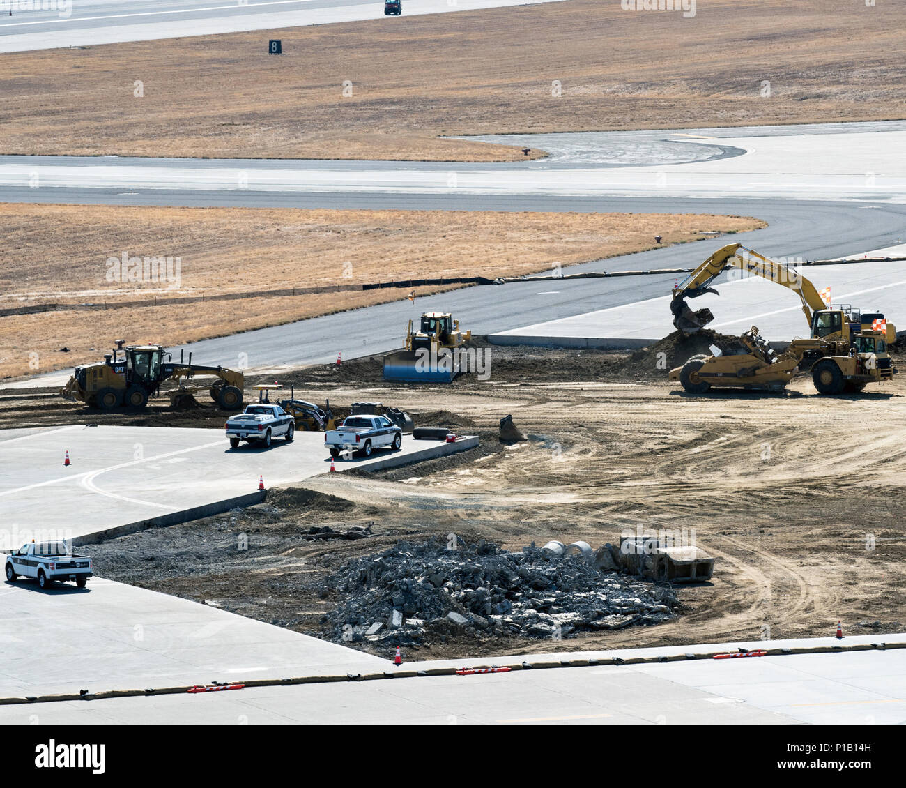 Construction crews are hard at work tearing up the tarmac at Travis Air ...