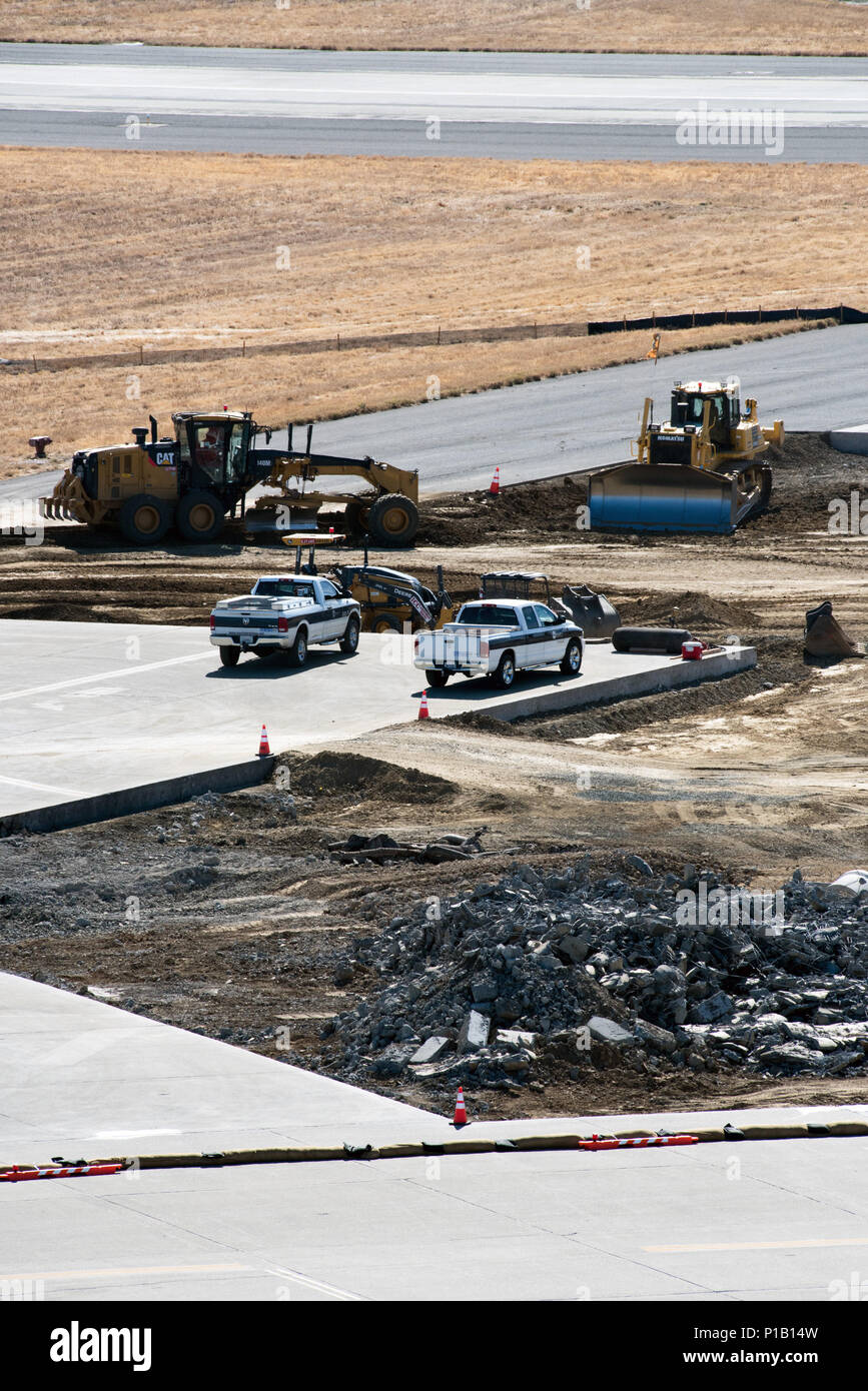 Construction crews are hard at work tearing up the tarmac at Travis Air ...
