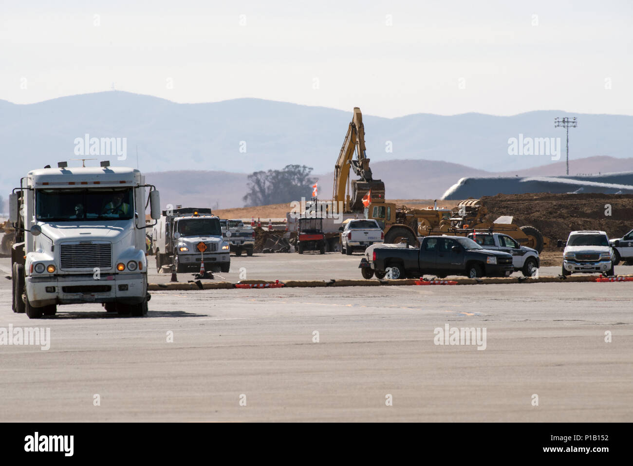 Construction crews are hard at work tearing up the tarmac at Travis Air ...