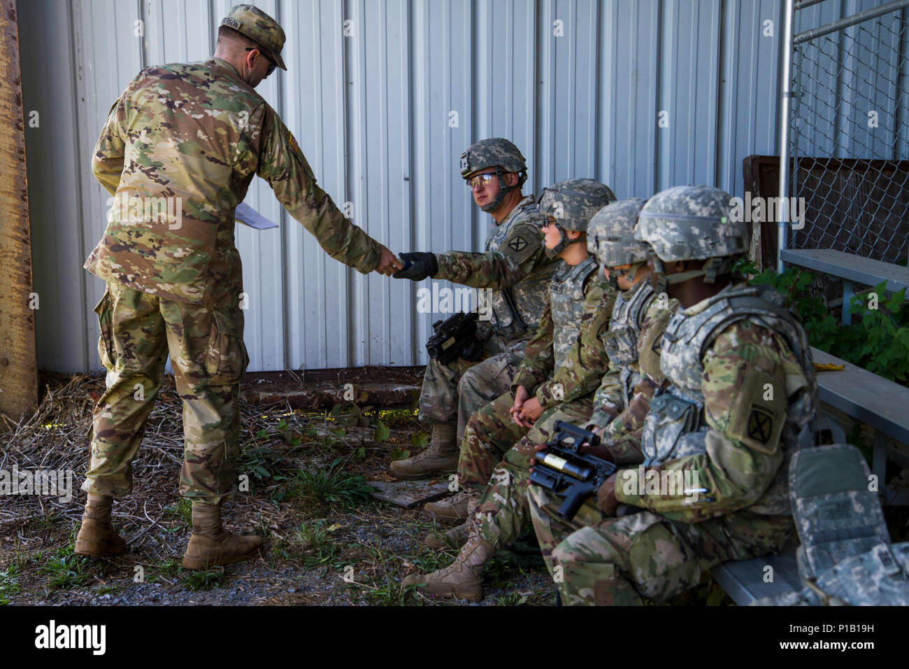 Soldiers from 277th Aviation Support Battalion HHC receive a safety ...