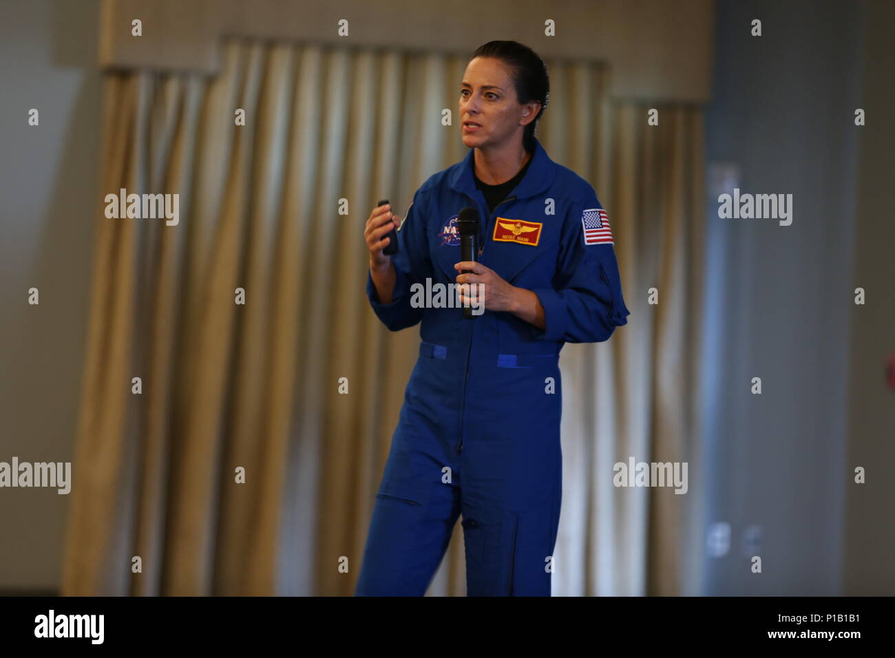 Lt. Col. Nicole “Duke” Mann speaks to Marines during a seminar aboard ...