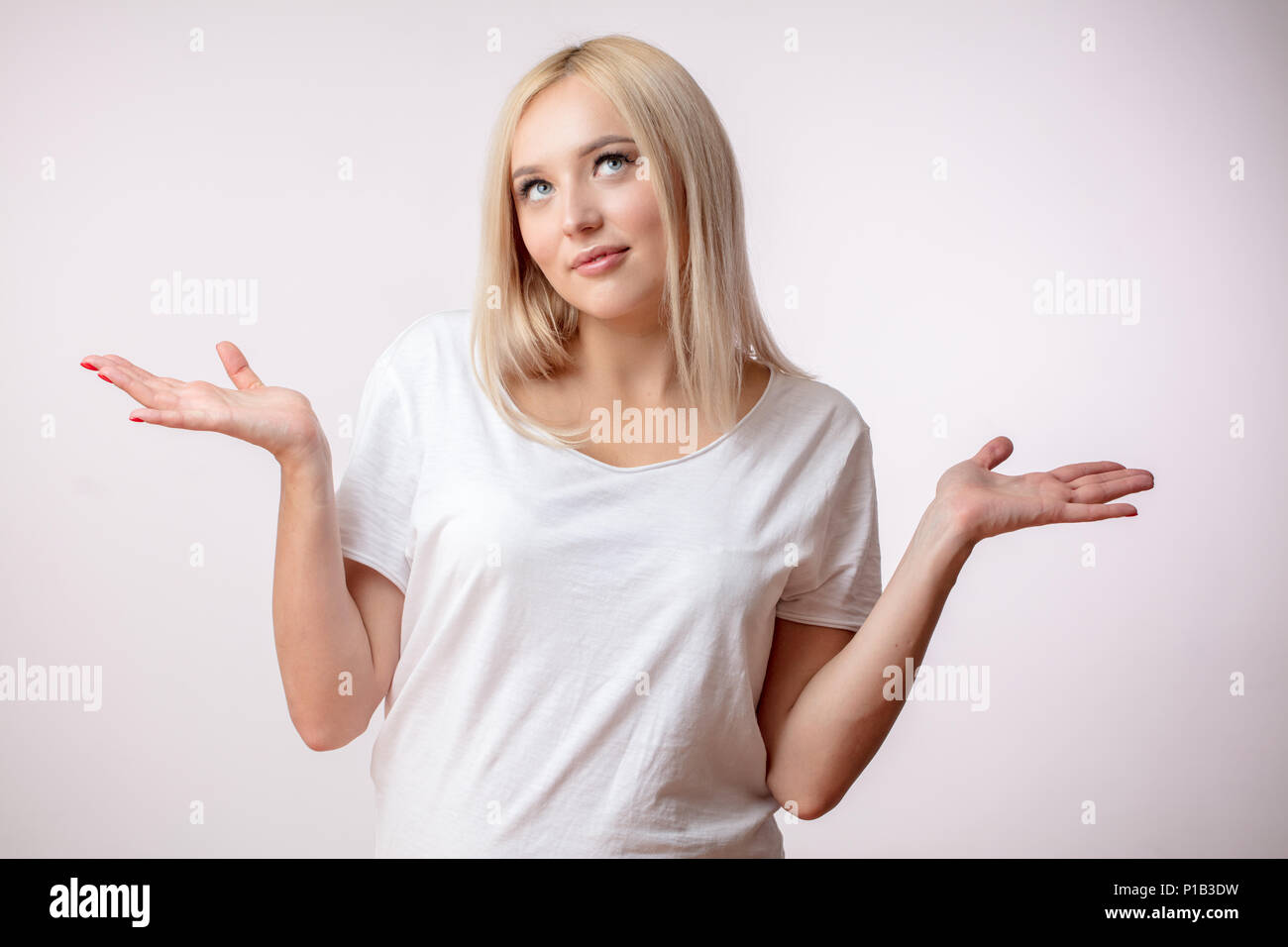 young woman is indifferent to the problem Stock Photo - Alamy