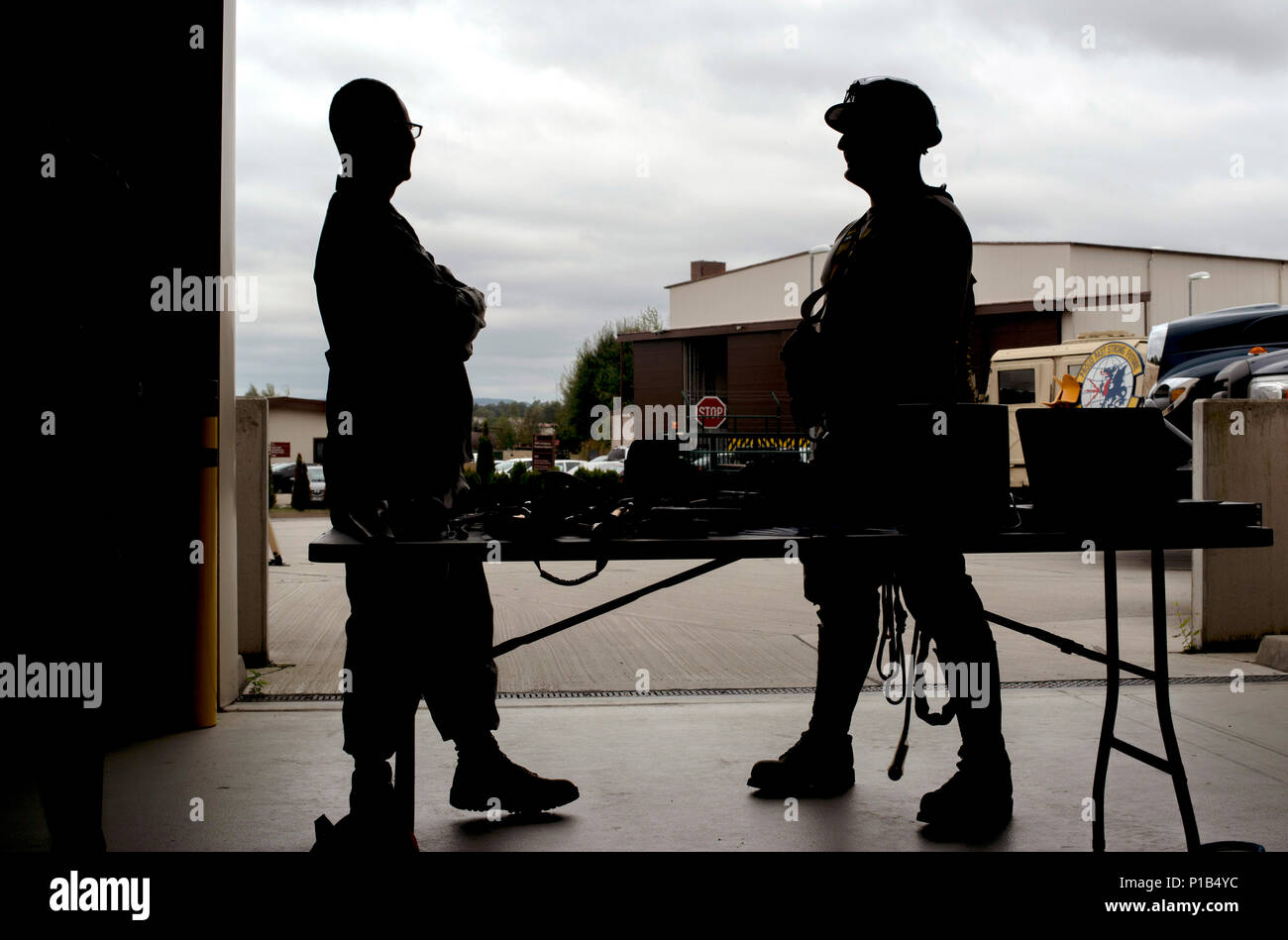 From left, Lt. Col. Mark Roman, 1st Communications Maintenance Squadron ...