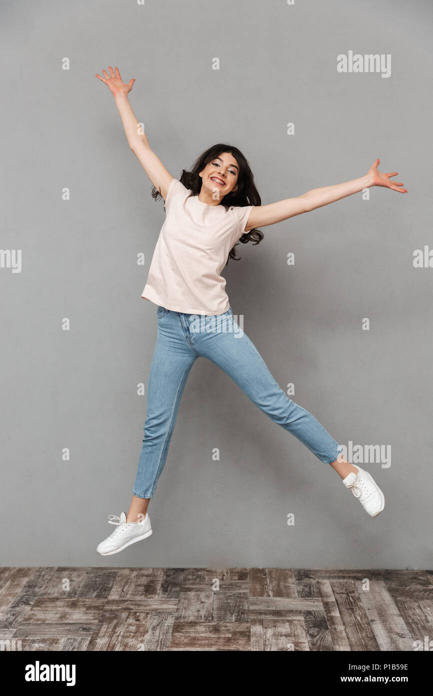 Lady jumping hi-res stock photography and images - Alamy